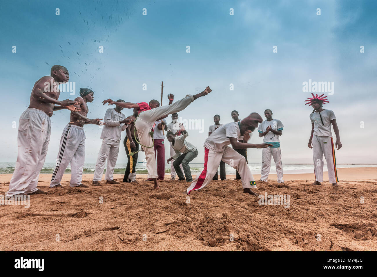 NAMIBE/ANGOLA - 28 AUG 2013 - African sportsmen practicing the famous ...