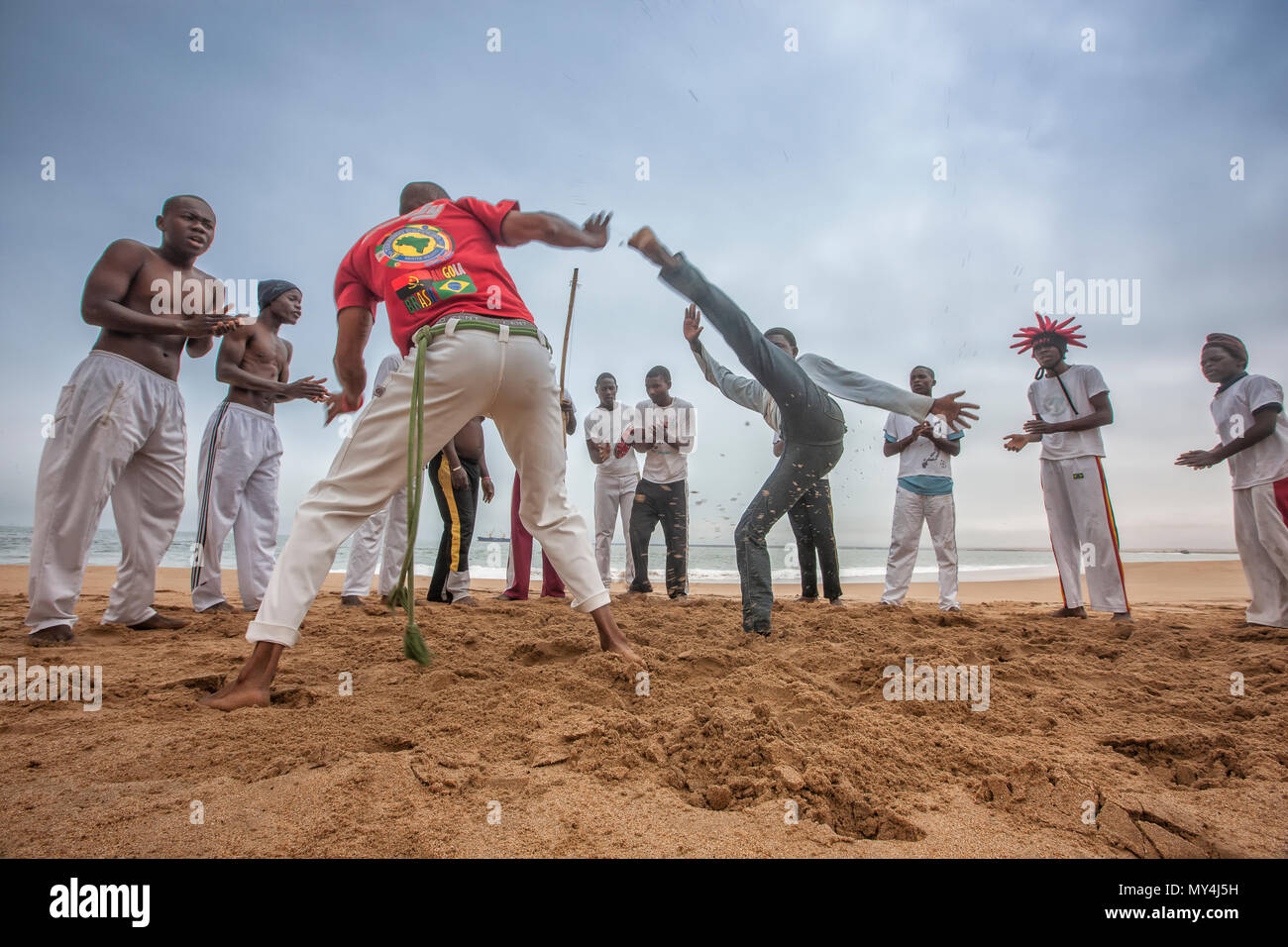 NAMIBE/ANGOLA - 28 AUG 2013 - African sportsmen practicing the famous ...