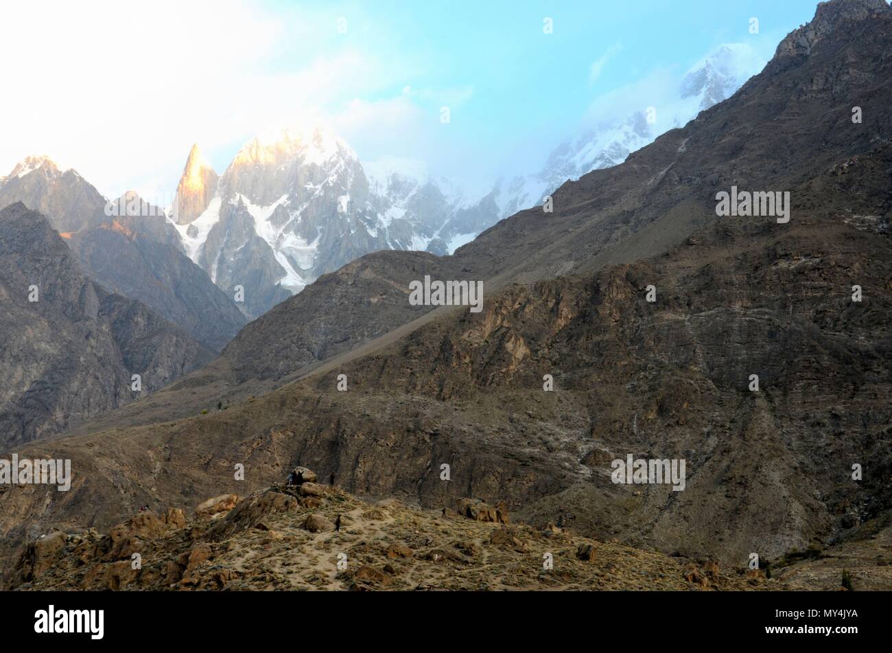 Snow capped mountains in Hunza Valley at sunrise Gilgit-Baltistan ...