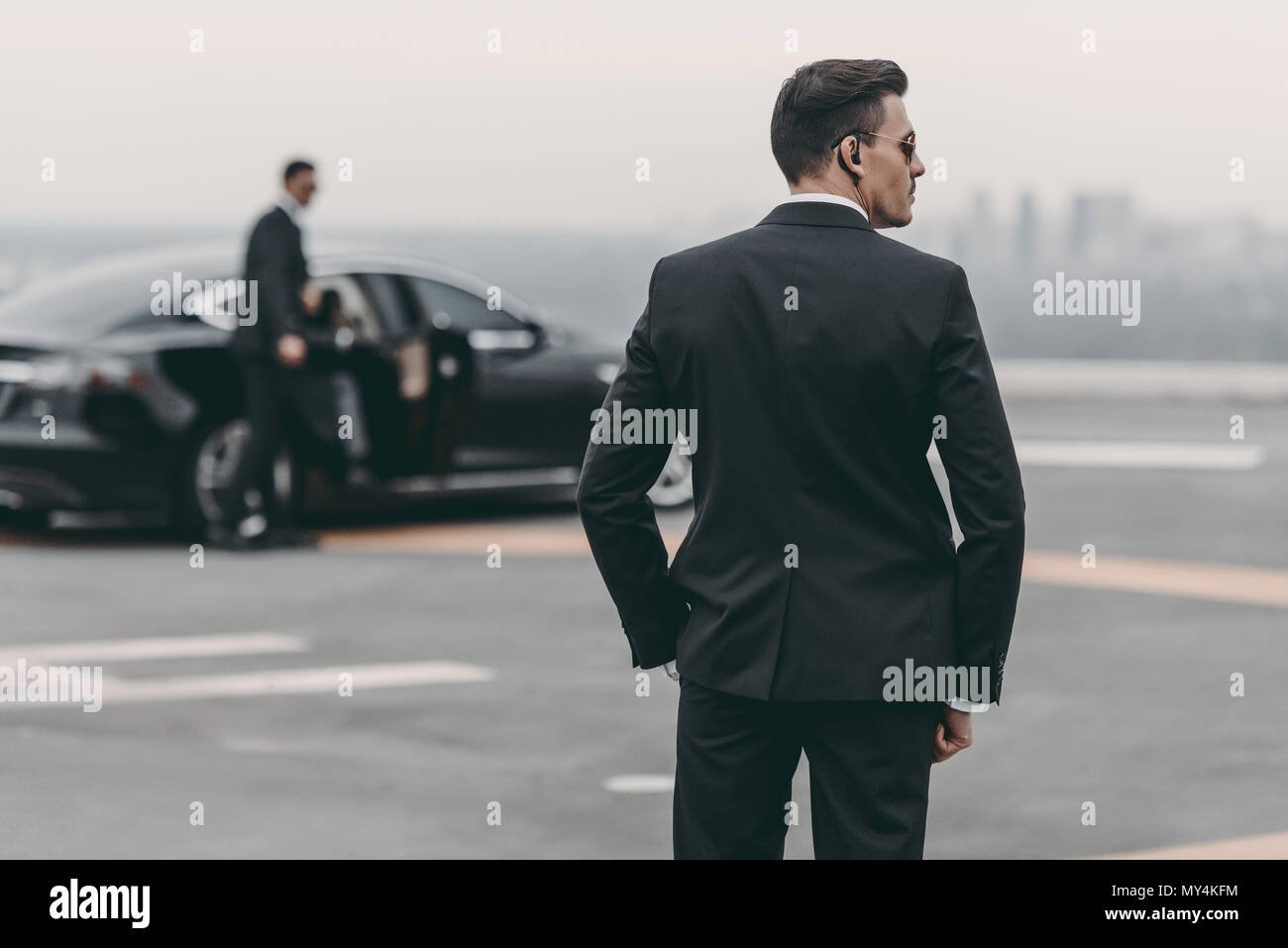 Bodyguards rear hi-res stock photography and images - Alamy