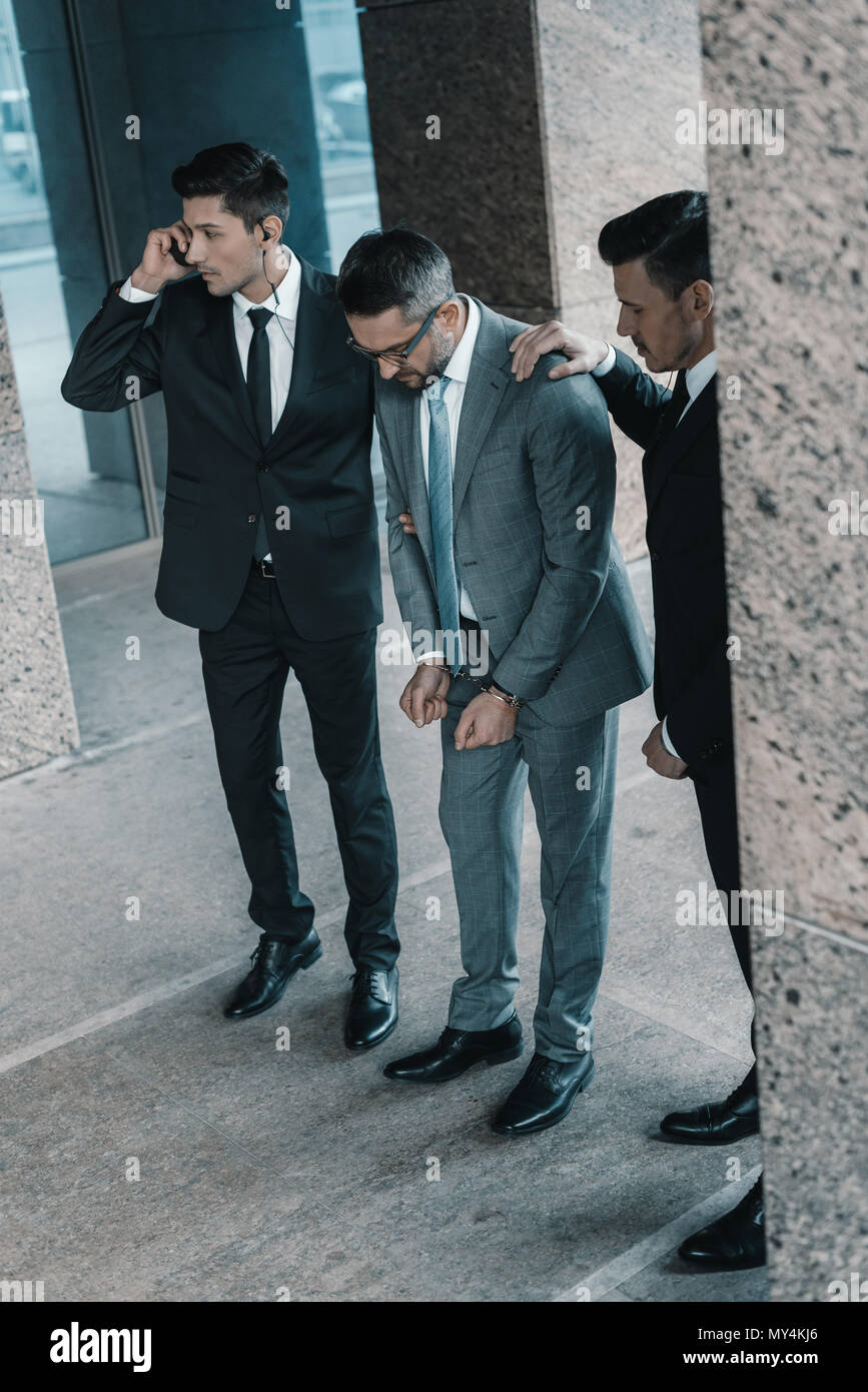 Suspect detention hi-res stock photography and images - Alamy