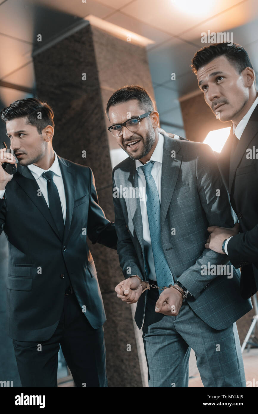 Security guards arresting hi-res stock photography and images - Alamy