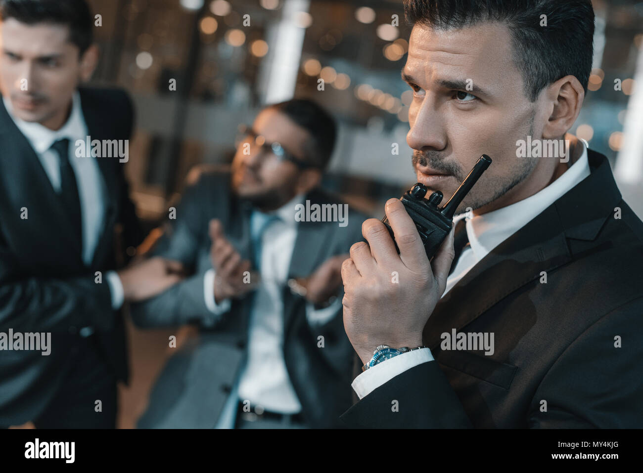 Security guard talking hi-res stock photography and images - Alamy