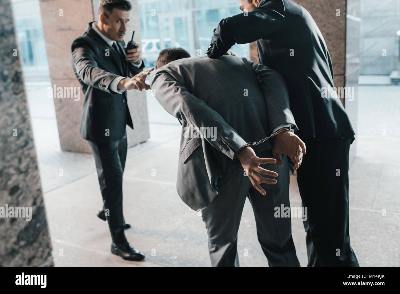 Security arrest arresting hi-res stock photography and images - Alamy