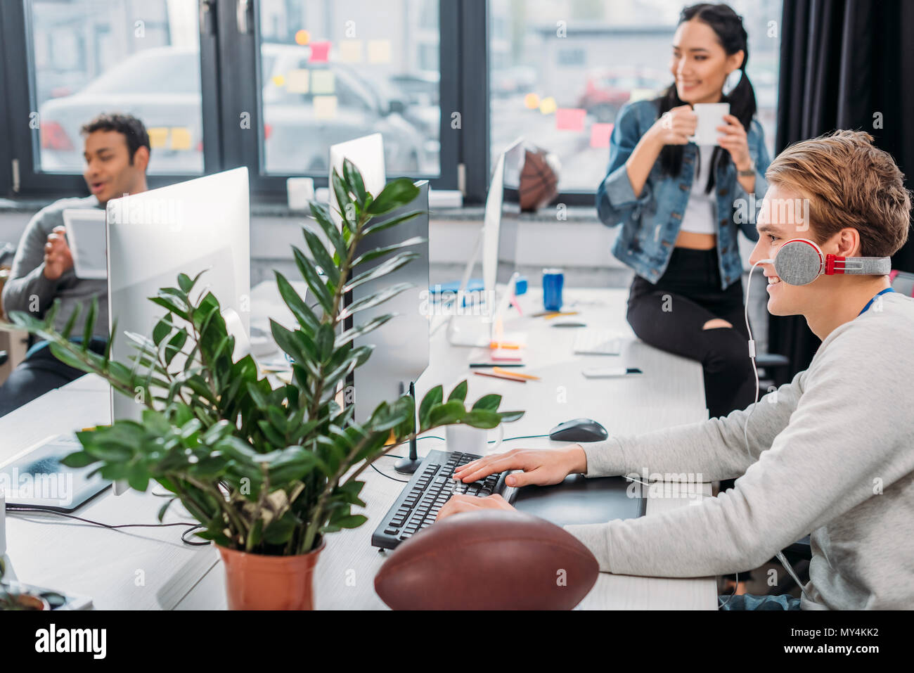 happy people at work in modern office Stock Photo - Alamy