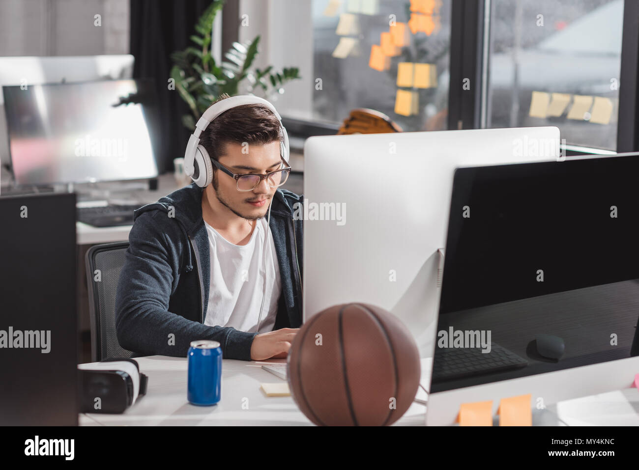Young man working on computer hi-res stock photography and images - Alamy