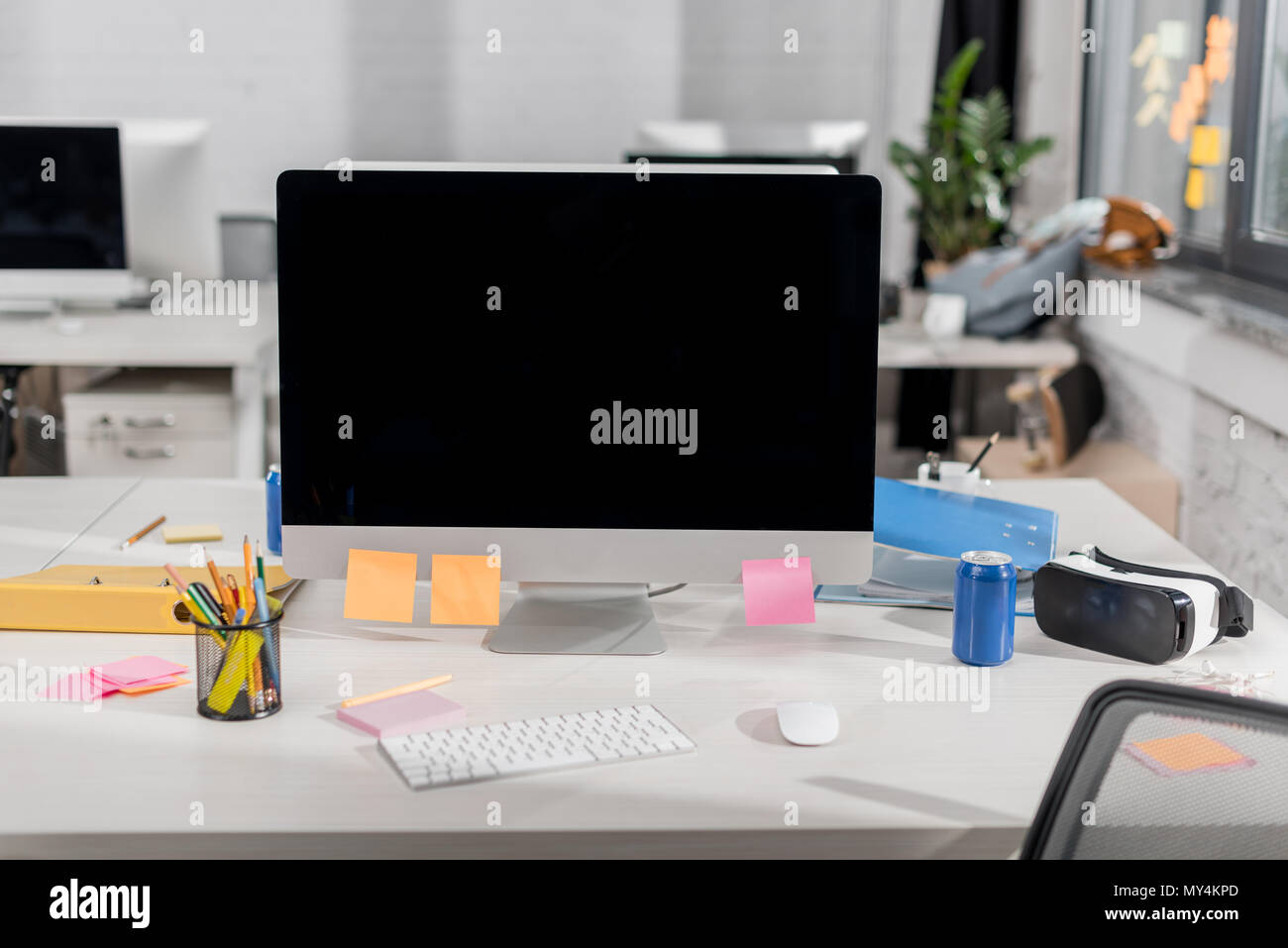 modern computer with blank screen at workplace in office Stock Photo ...
