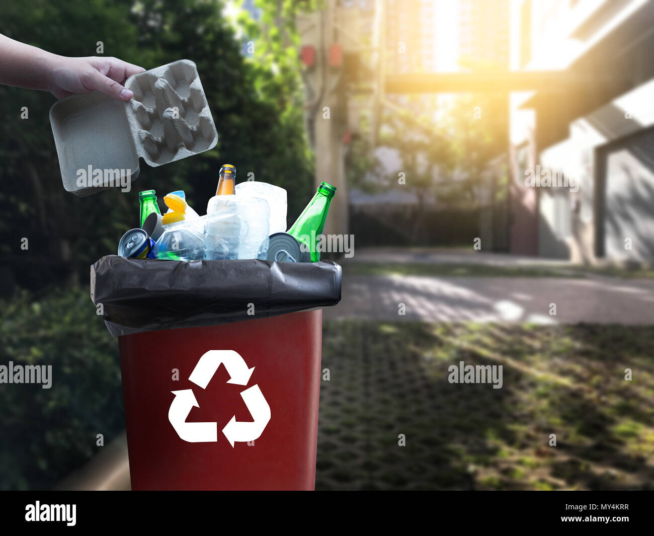 man hand putting plastic reuse for recycling concept environmental ...