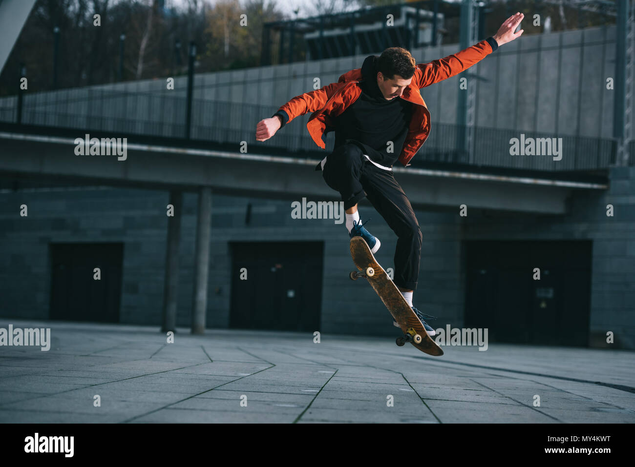 Skateboarder doing jump trick hi-res stock photography and images - Alamy