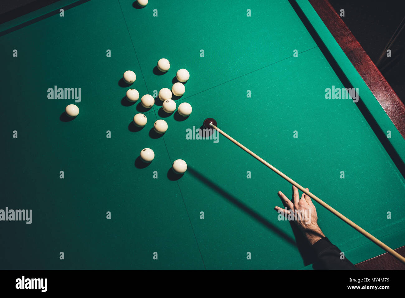 Image of man playing pool hi-res stock photography and images - Alamy