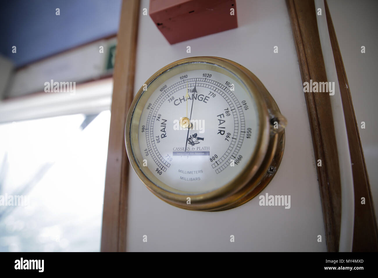 Barometer in the captain’s control room in a tug boat Stock Photo - Alamy