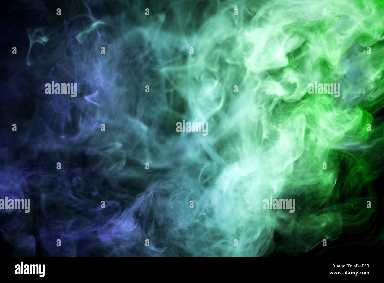 Cloud of blue,green smoke on a black isolated background. Background ...