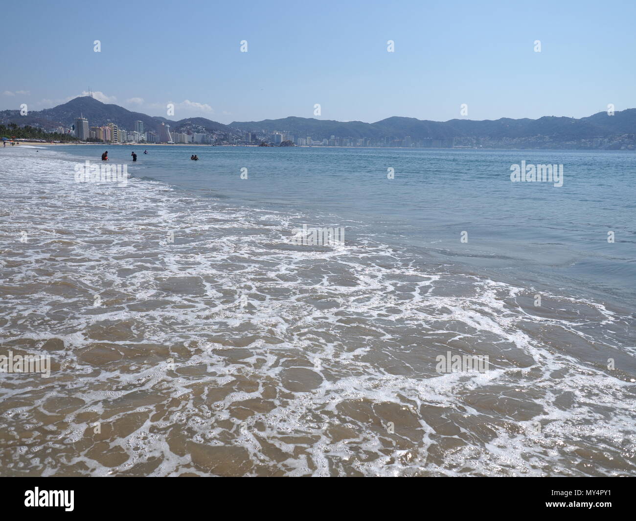 Sandy beach at bay of ACAPULCO city in Mexico with scenery of panoramic ...