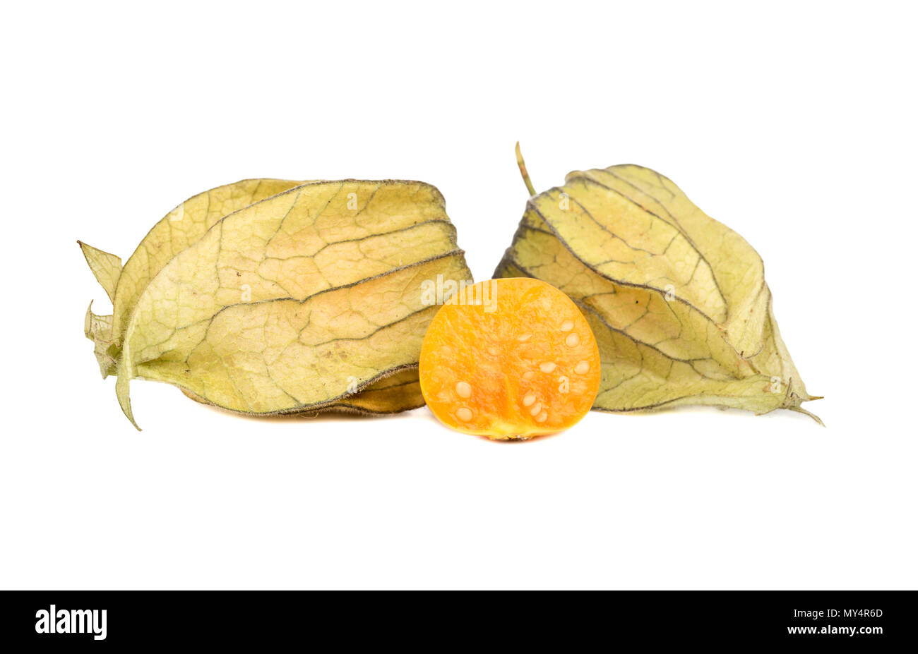 Fresh fruit physalis in the husk with a juicy half on a white ...