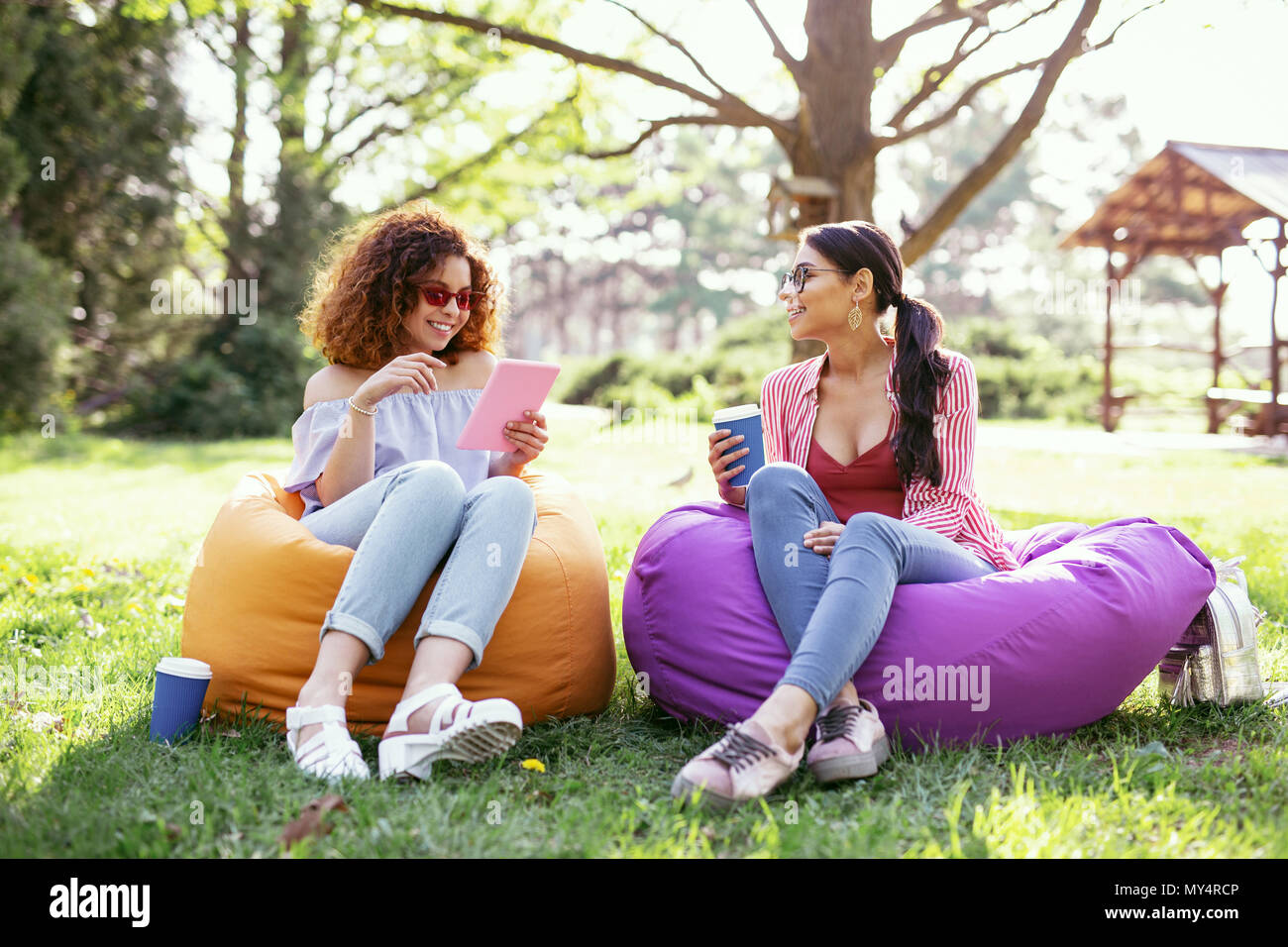 Joyful girls relaxing in the open air Stock Photo - Alamy