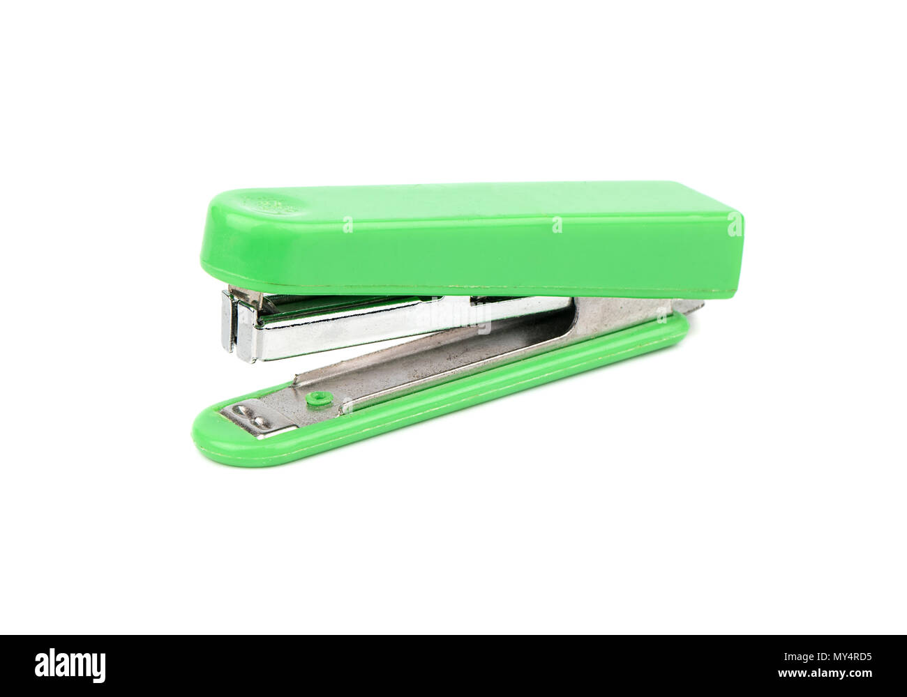 Green office stapler isolated on white background Stock Photo - Alamy
