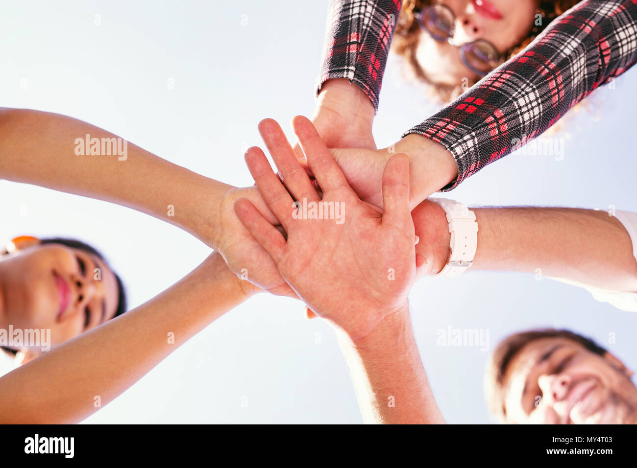 Happy colleagues pleased with their work Stock Photo - Alamy
