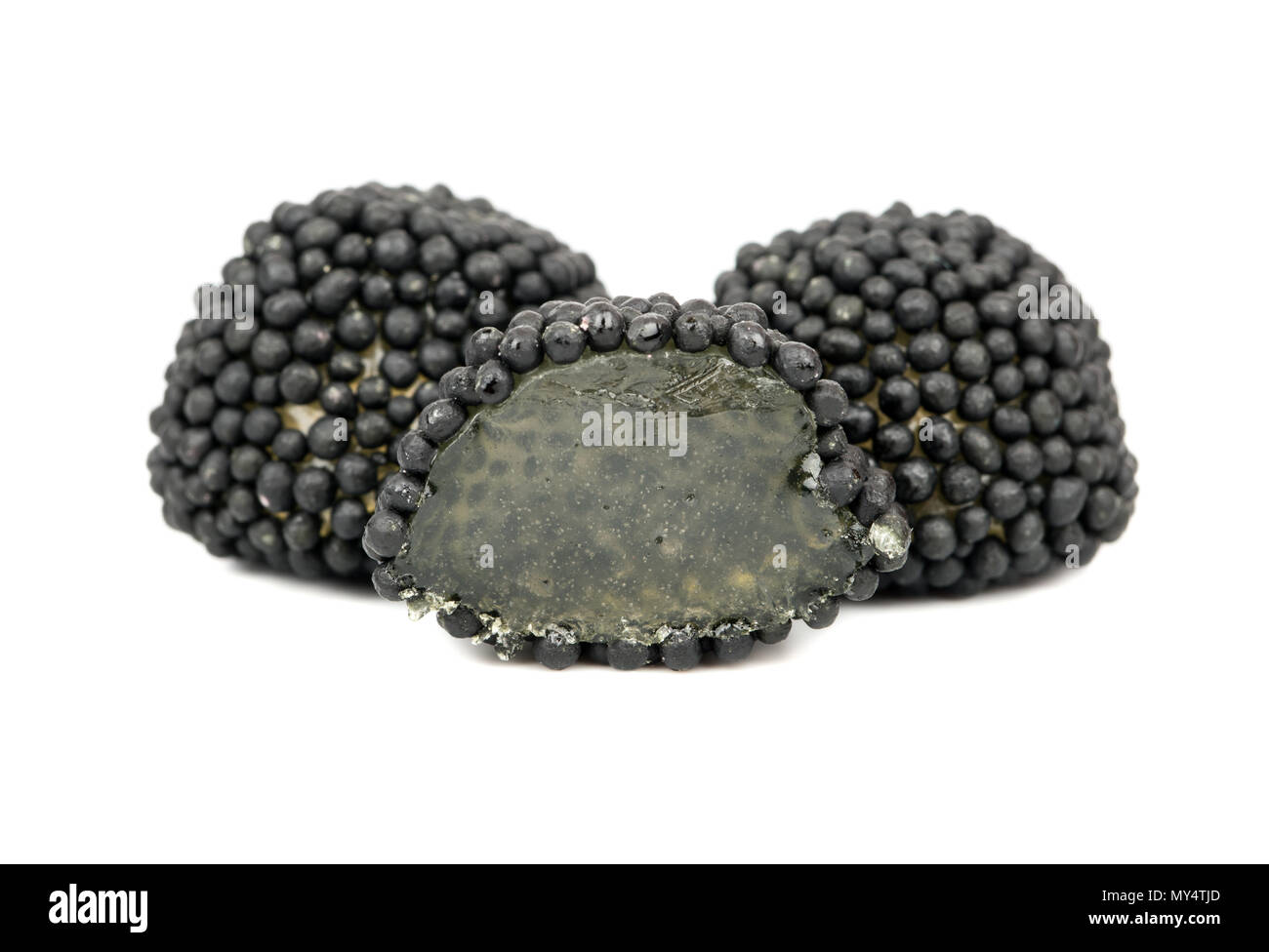 Black berry jelly candies with half isolated on white background Stock ...
