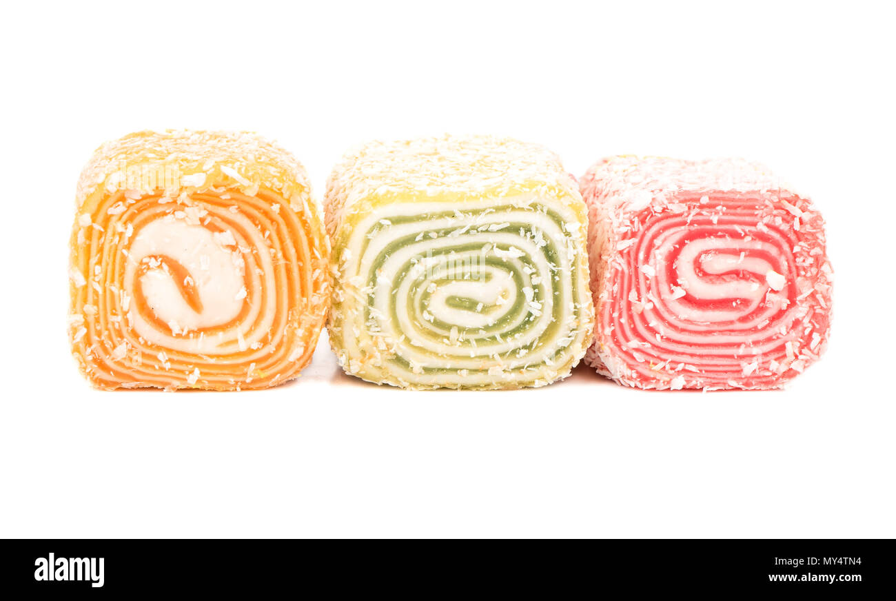Three colored turkish delight on white background Stock Photo - Alamy