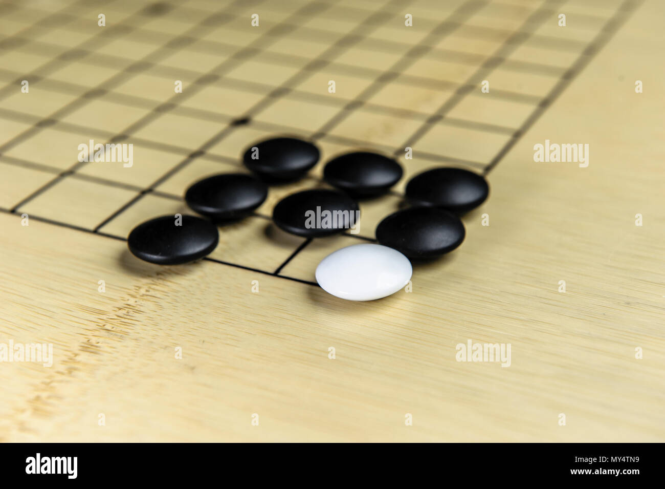 white stone wound up in a corner Stock Photo - Alamy