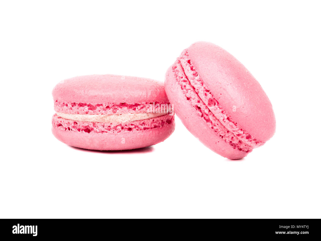 Two pink macaroon with cream isolated on white background Stock Photo ...
