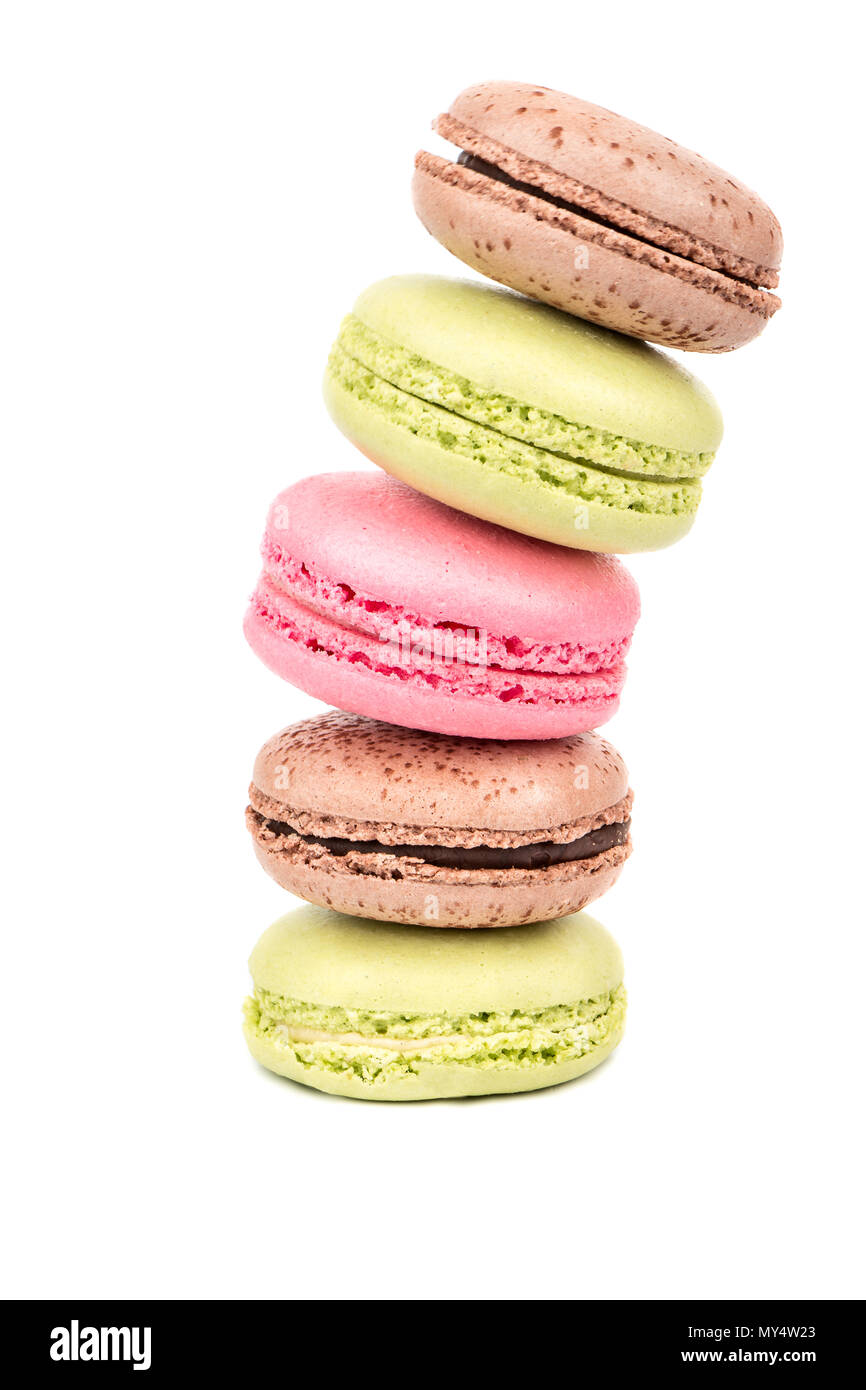 Large stack falling of multicolored macaroon on a white background ...