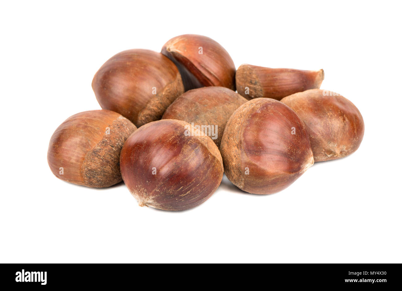 Small bunch of fresh edible chestnuts on a white background Stock Photo ...