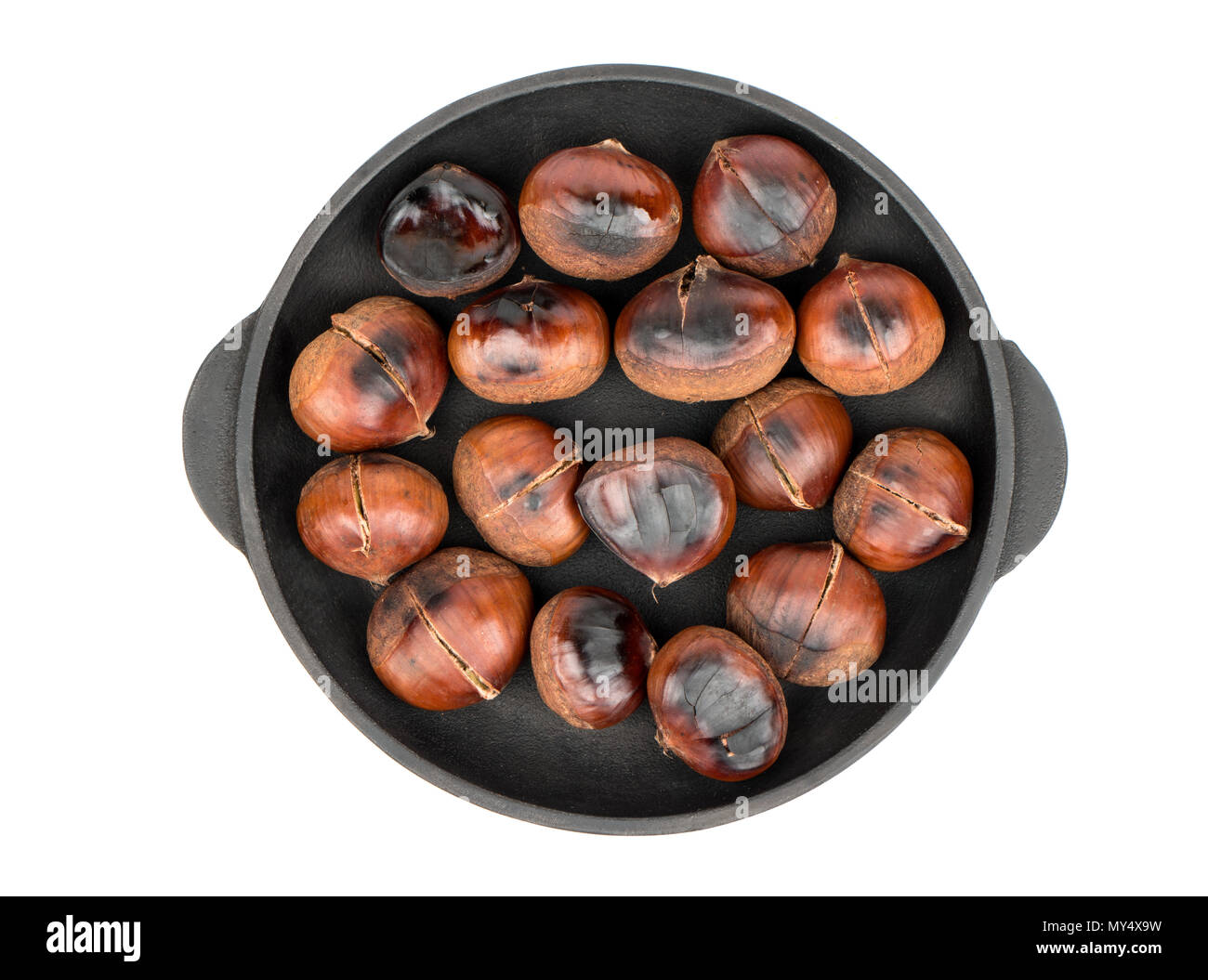 Delicious fried chestnuts in pan isolated on white background Stock ...