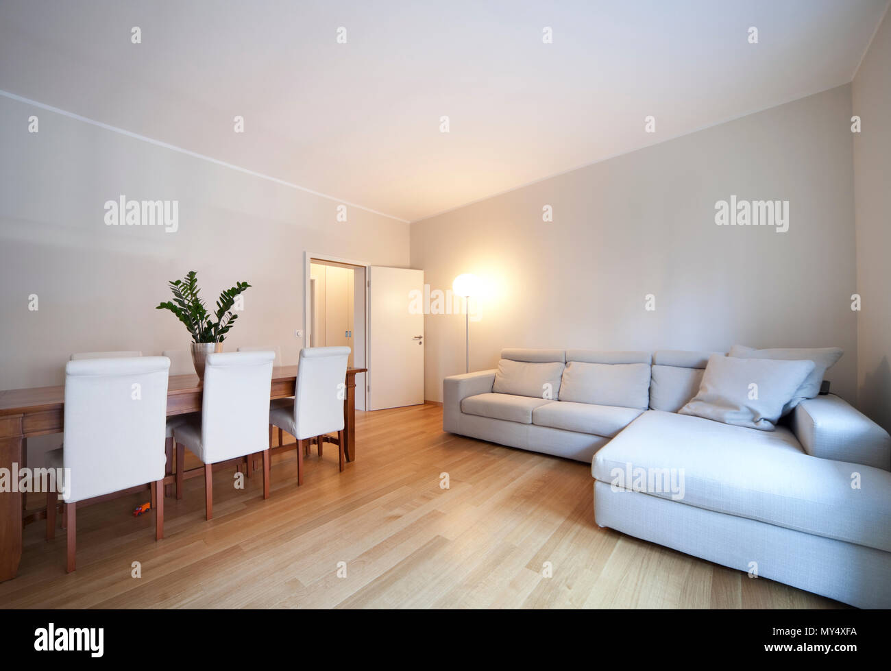 bright modern apartment, angle sofa Stock Photo - Alamy
