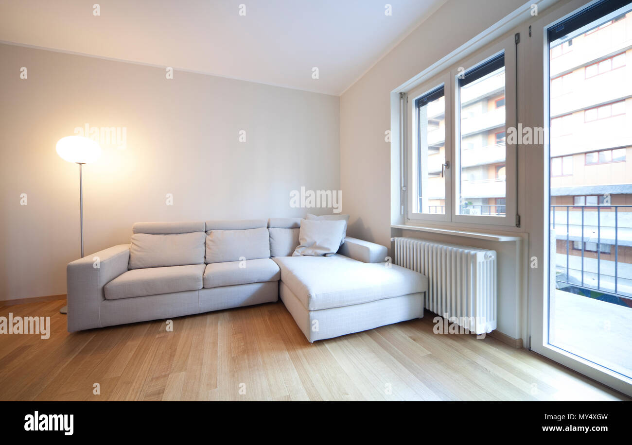bright modern apartment, angle sofa Stock Photo - Alamy