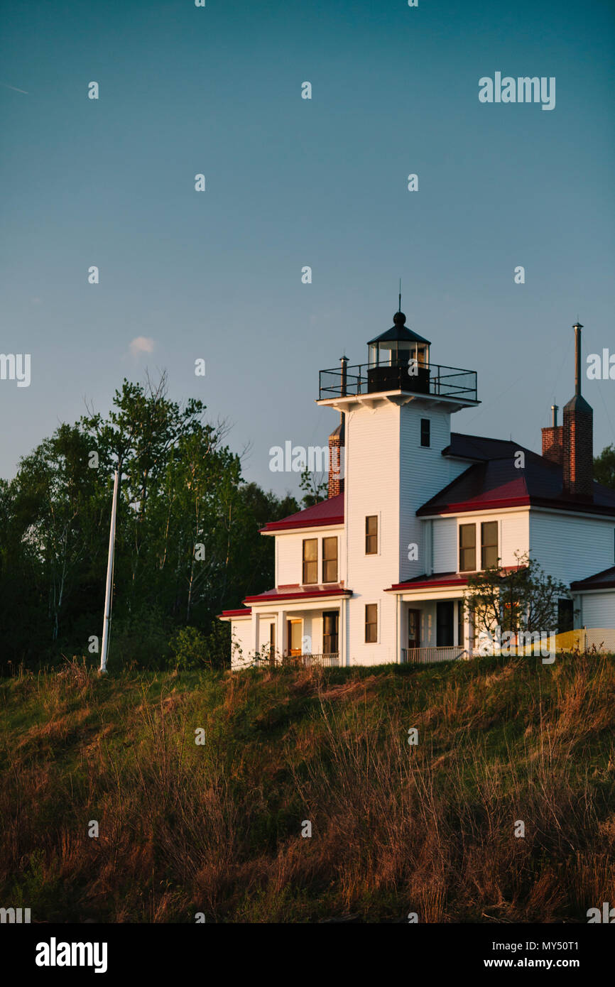 Sunset view of Raspberry Island Lighthouse on the shore of Lake ...