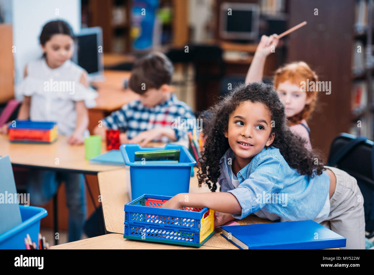 Little kids in library hi-res stock photography and images - Alamy