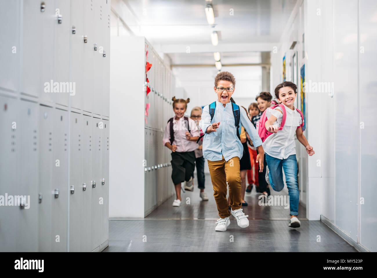 School Children Running Into School High Resolution Stock Photography ...