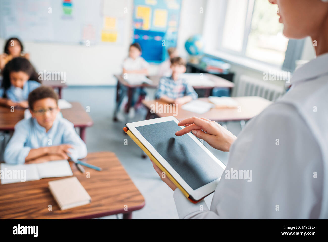 teacher using digital tablet with blank screen Stock Photo - Alamy teacher using digital tablet with blank screen Stock Photo - Alamy