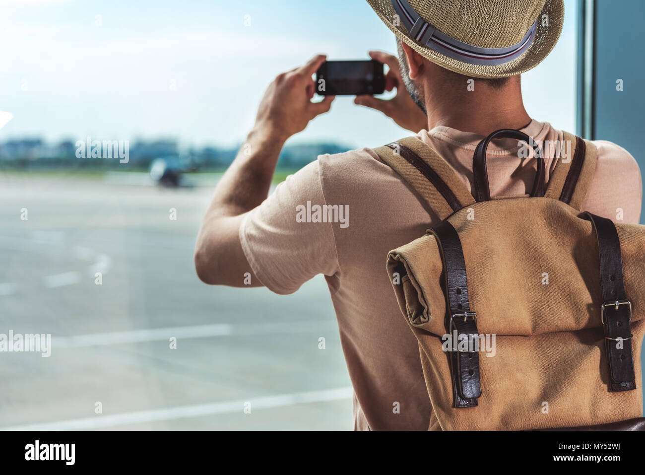 Back view of man taking picture of hi-res stock photography and images ...