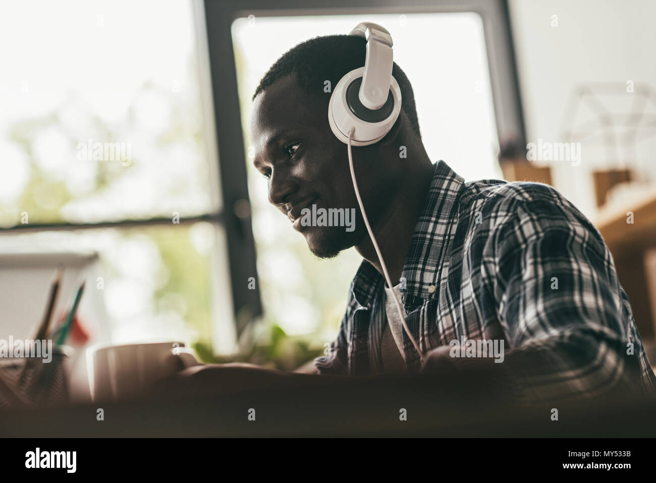 young happy african american man in headphones Stock Photo - Alamy