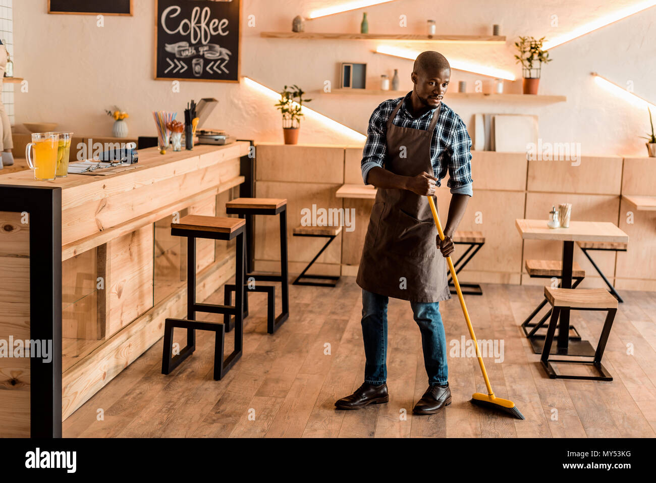 Worker sweeping hi-res stock photography and images - Alamy