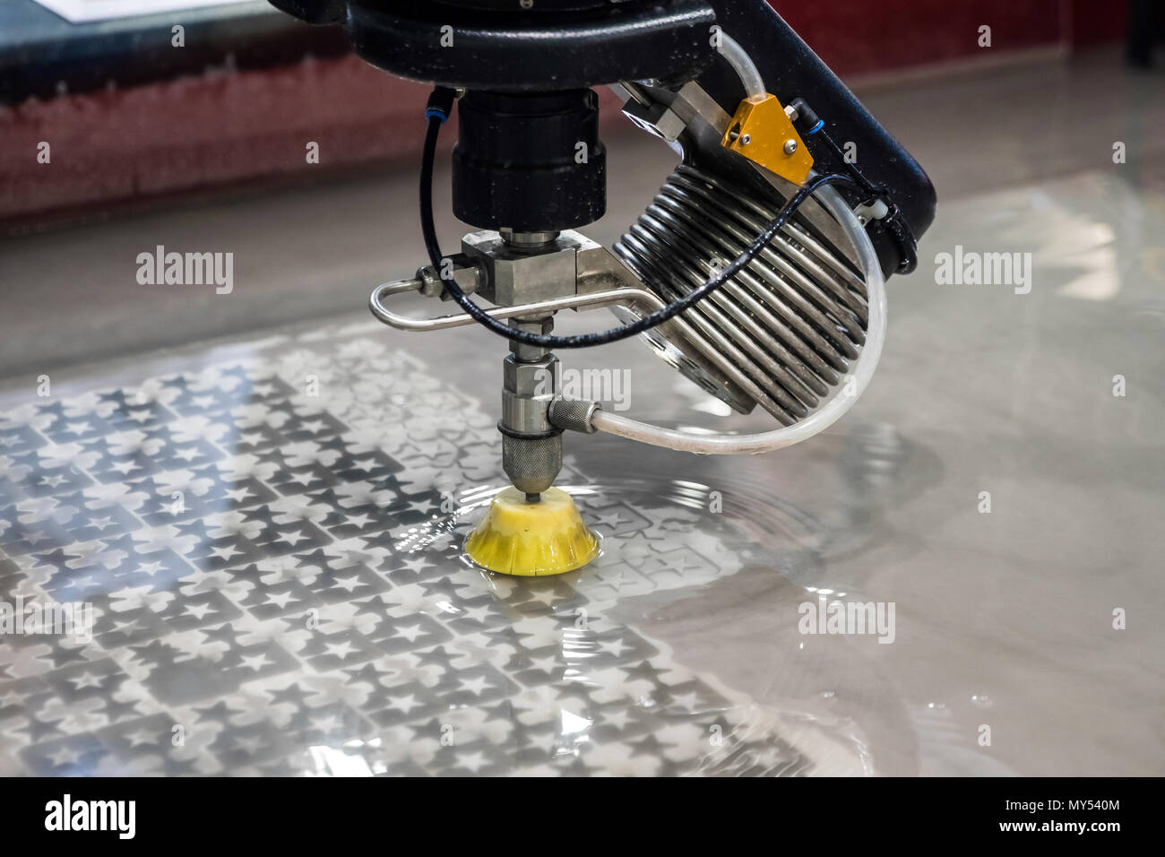 Precision 5 axis cutting head with direct drive technology Stock Photo ...