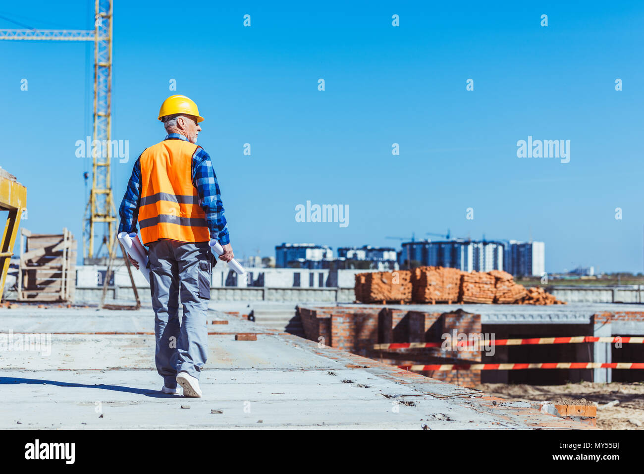 Engineer plans walking hi-res stock photography and images - Alamy