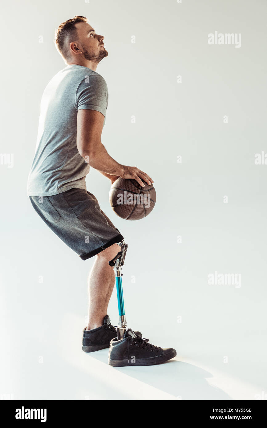 side view of basketball player throwing basketball ball isolated on ...