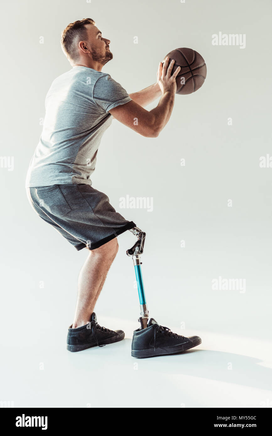 side view of basketball player throwing basketball ball isolated on ...