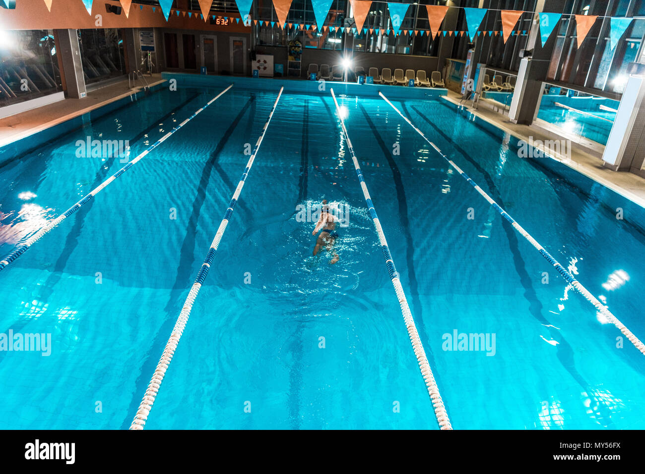 overhead view of swimmer in competition swimming pool Stock Photo - Alamy