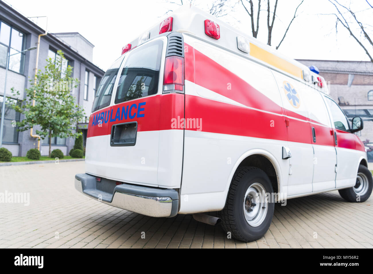 ambulance white and red car on street Stock Photo - Alamy