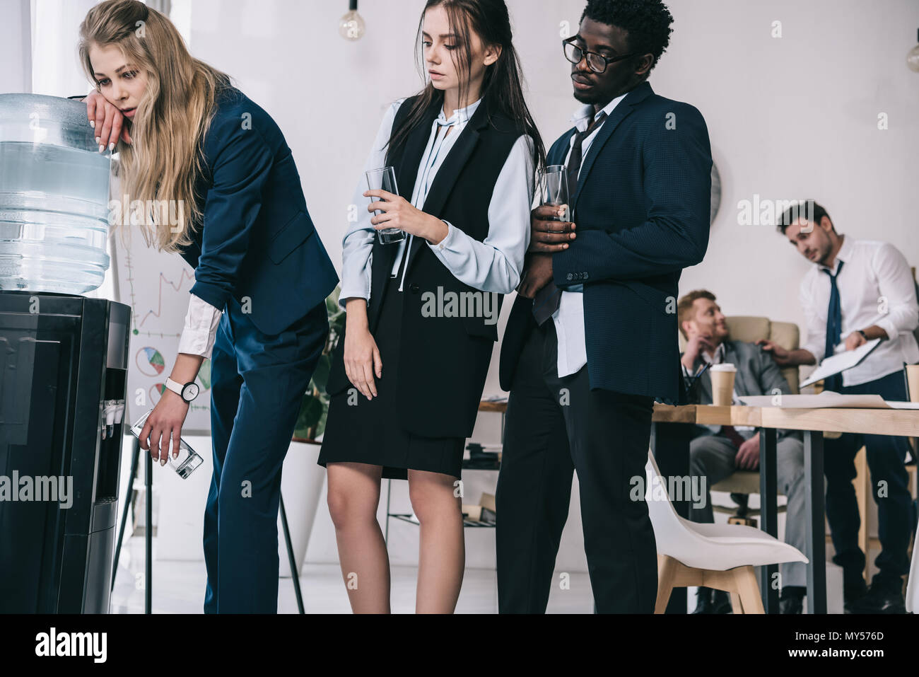 People standing for water queue hi-res stock photography and images - Alamy