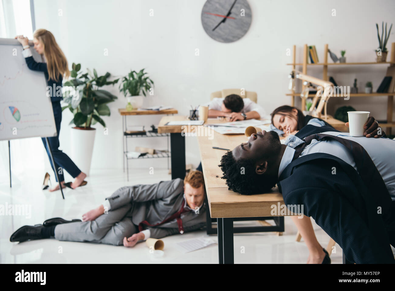 Sleeping At Meeting Conference Table Photo