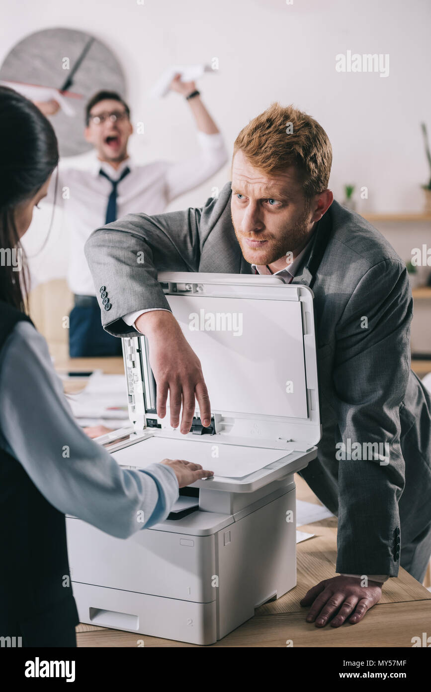 Businessman helping colleague hi-res stock photography and images - Alamy