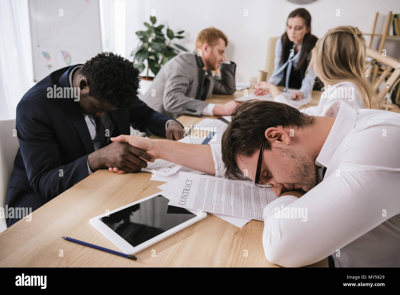 Business people sleeping in conference hi-res stock photography and ...