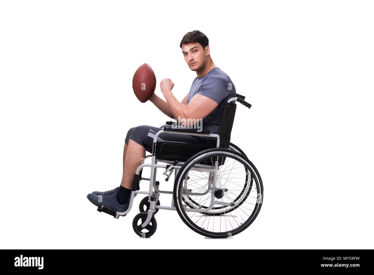 Football player recovering from injury on wheelchair Stock Photo - Alamy