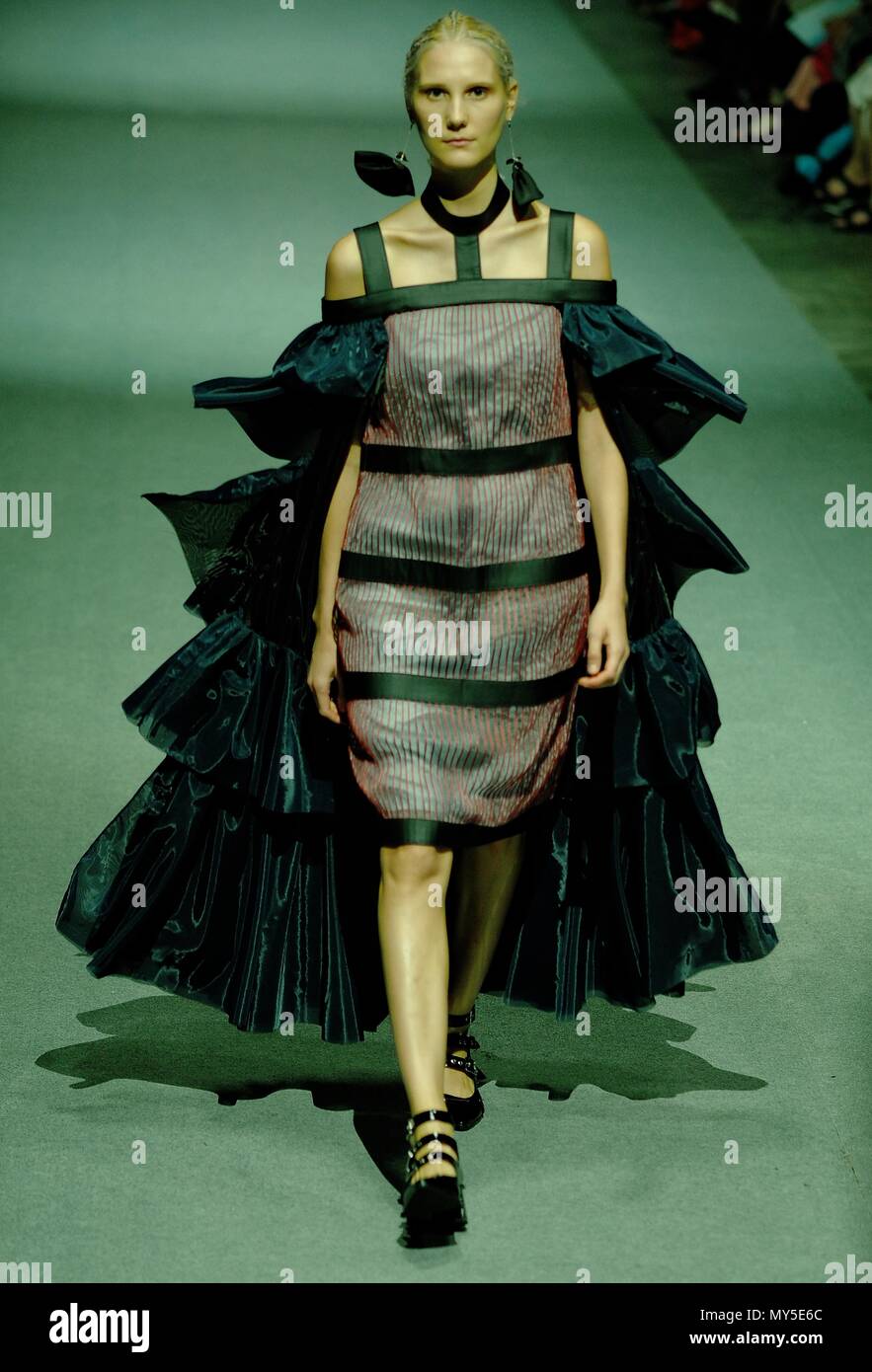 Hong Kong, China. 5th June, 2018. A model presents a fashion creation ...