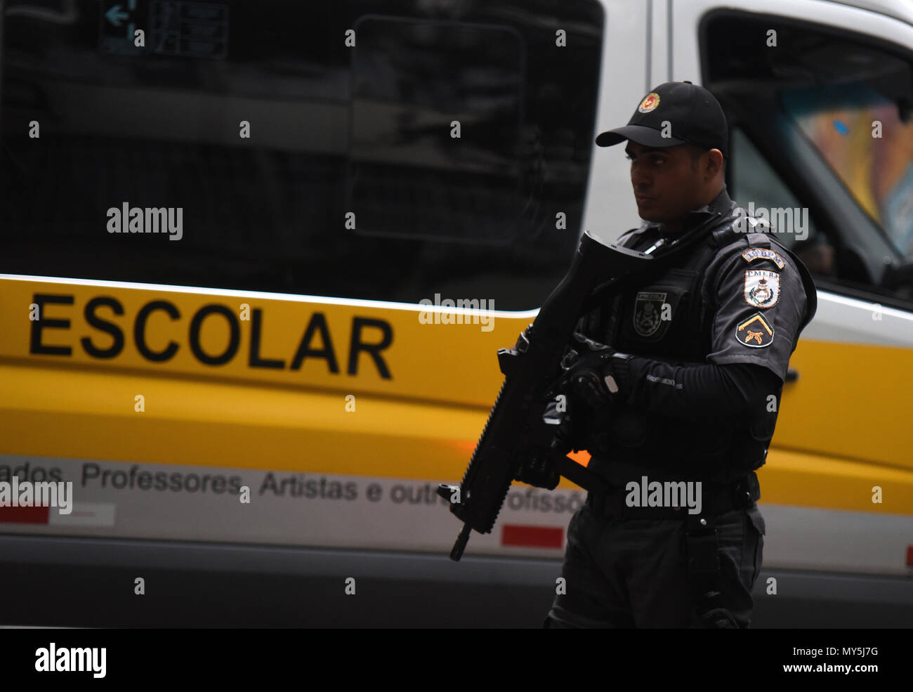 05 June 2018, Brazil, Rio De Janeiro: A police officer walking in front ...